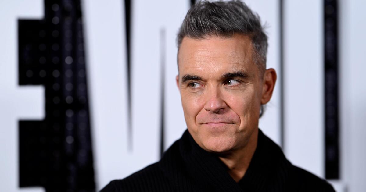 Robbie Williams kriegt neue Zähne - Video | 1&1
